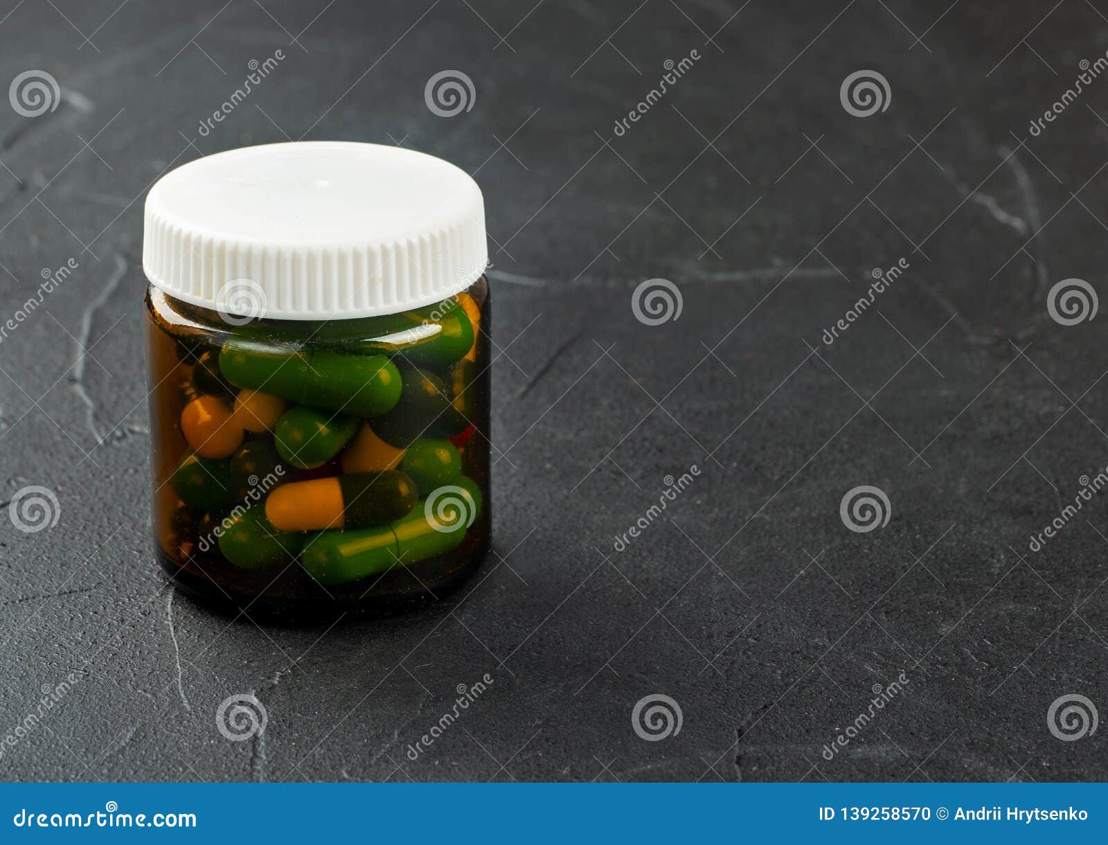 Capsules in a jar stock photo. Image of bottle, clear - 139258570