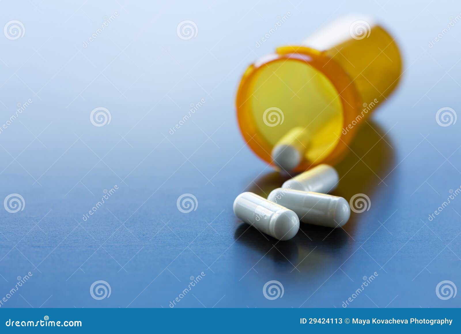 Capsules Spilled from Pill Bottle Stock Image - Image of drug ...