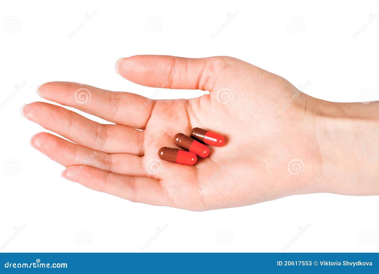 Capsules in woman s hand stock image. Image of health - 20617553