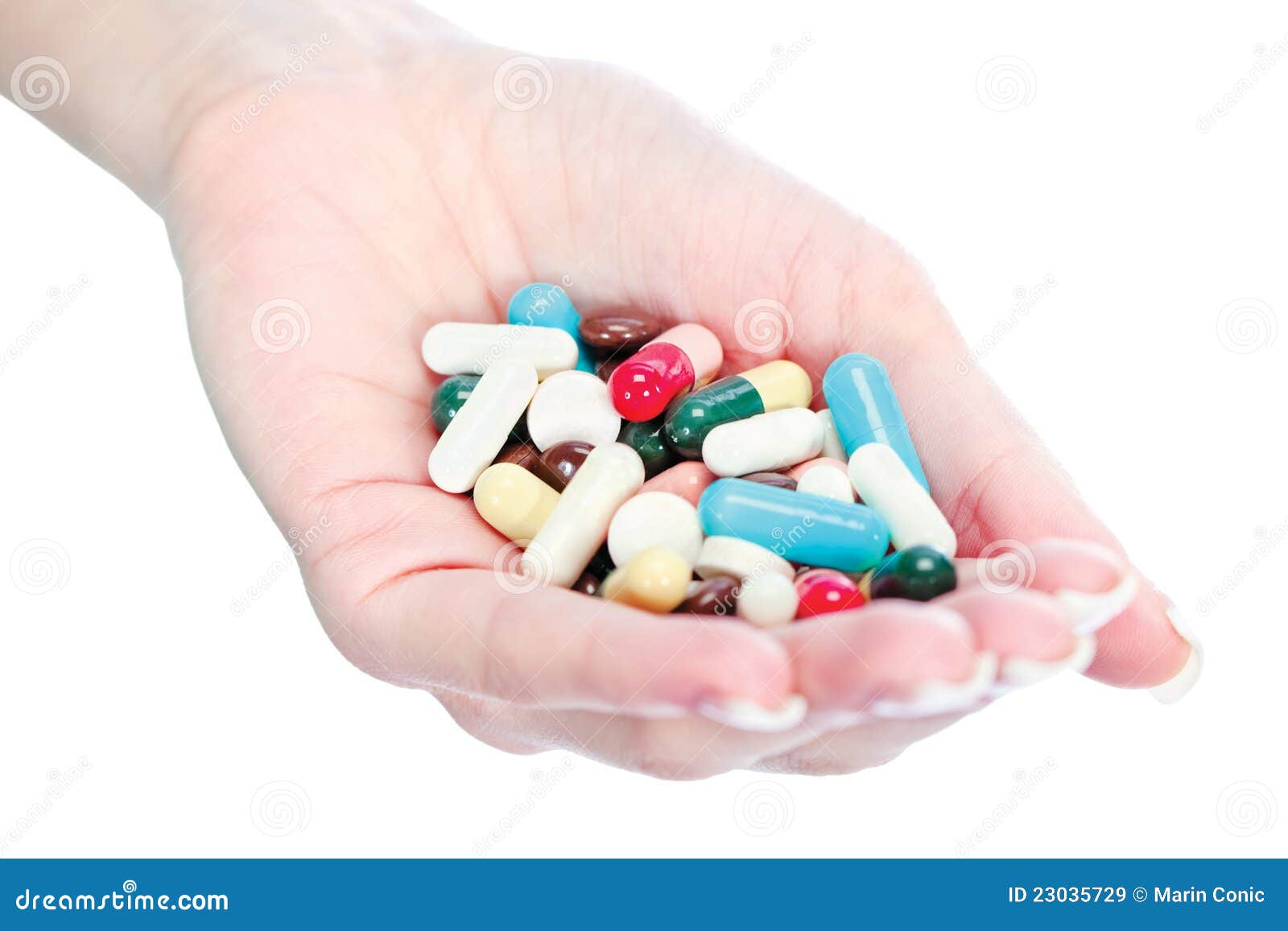 Capsules in woman s hand stock image. Image of female - 23035729
