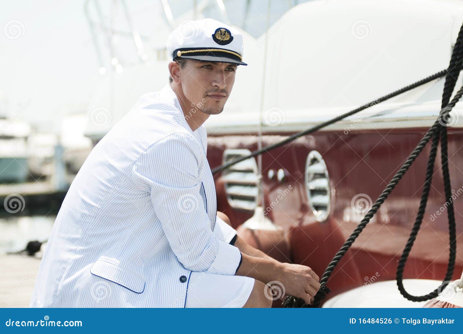 Captain Holding Rope of the Yacht Stock Photo - Image of sailing, crew ...