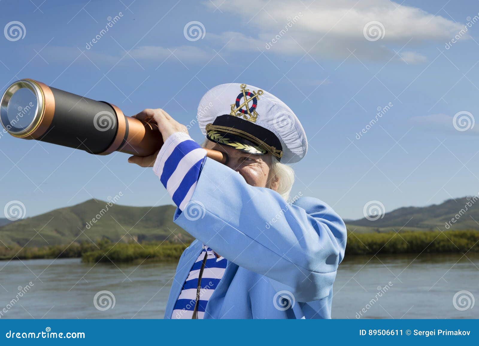 Captain Looks Through A Telescope Royalty-Free Stock Photo ...