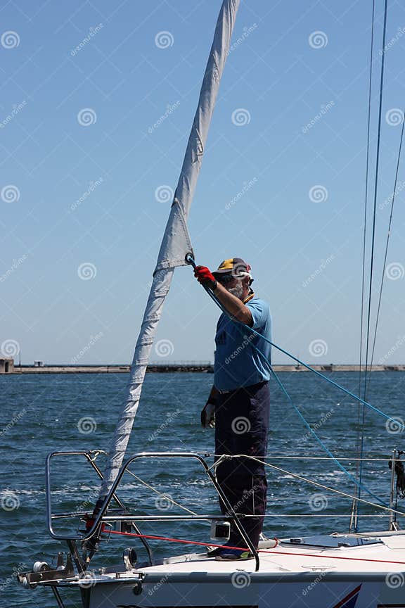Captain of sailboat editorial photography. Image of crew - 19681697