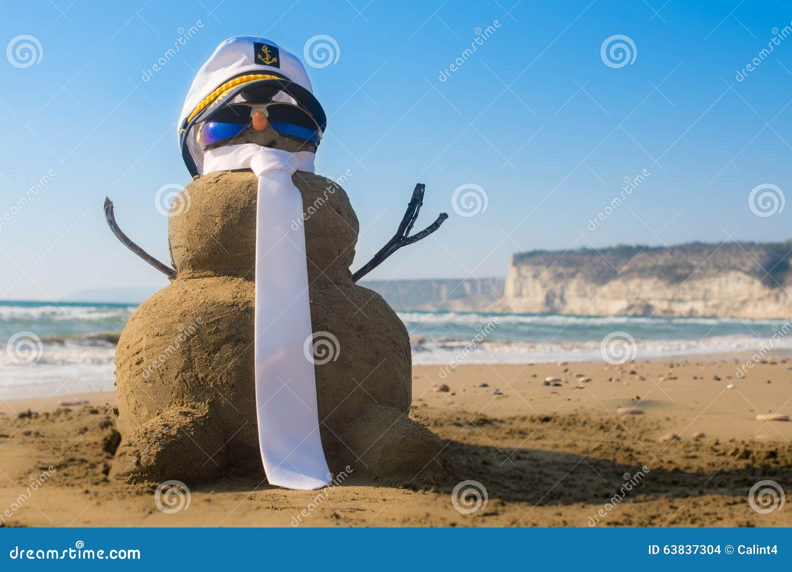 Captain Snowman Made of Sand Stock Photo - Image of dressed, santaclaus ...