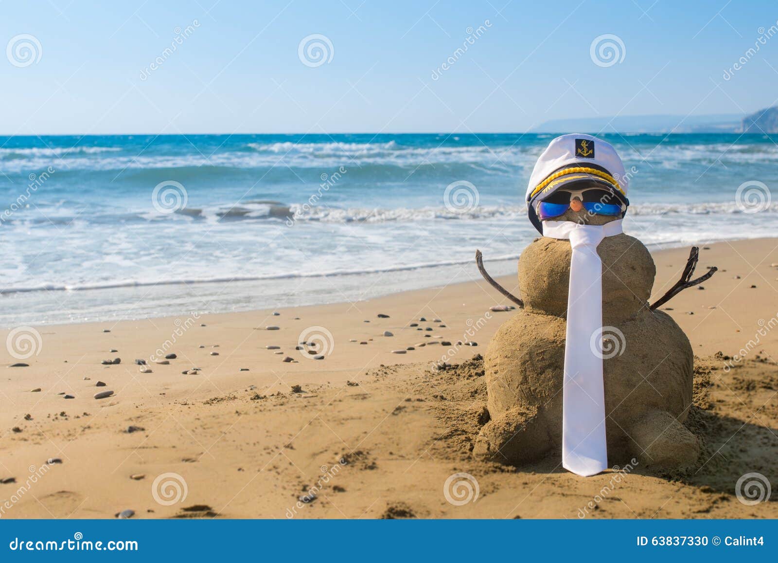 Captain Snowman Made of Sand Stock Photo - Image of dressed, captain ...
