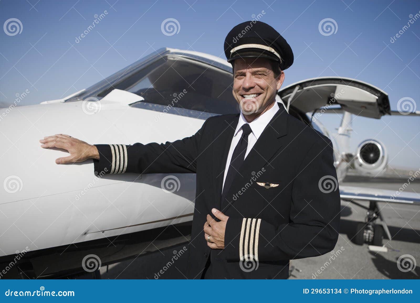 Captain Standing by Aircraft at Airfield Stock Photo - Image of ...
