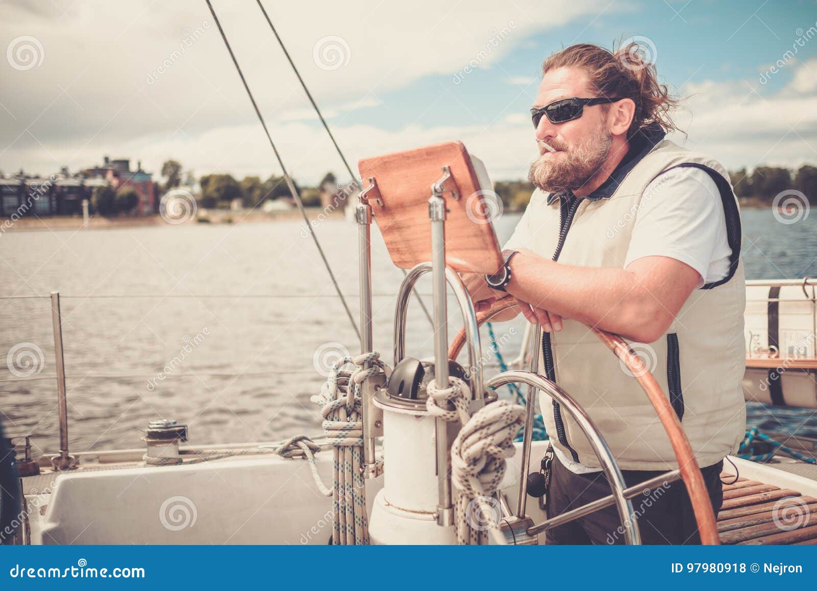 Captain on a Yacht Behind Steering Wheel Stock Photo - Image of ...