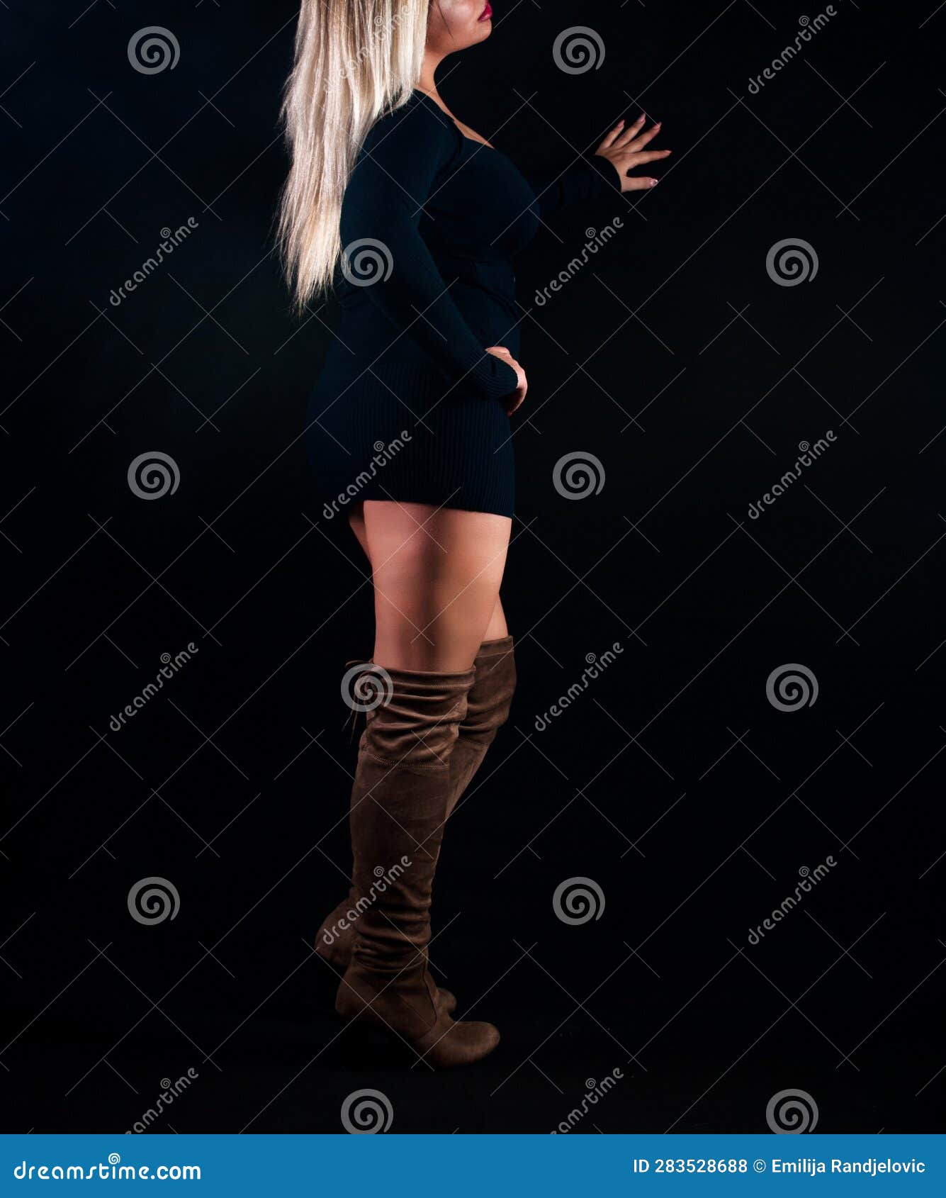 Captivating Curves: Stylish Woman with Confident Stance in Studio Stock ...