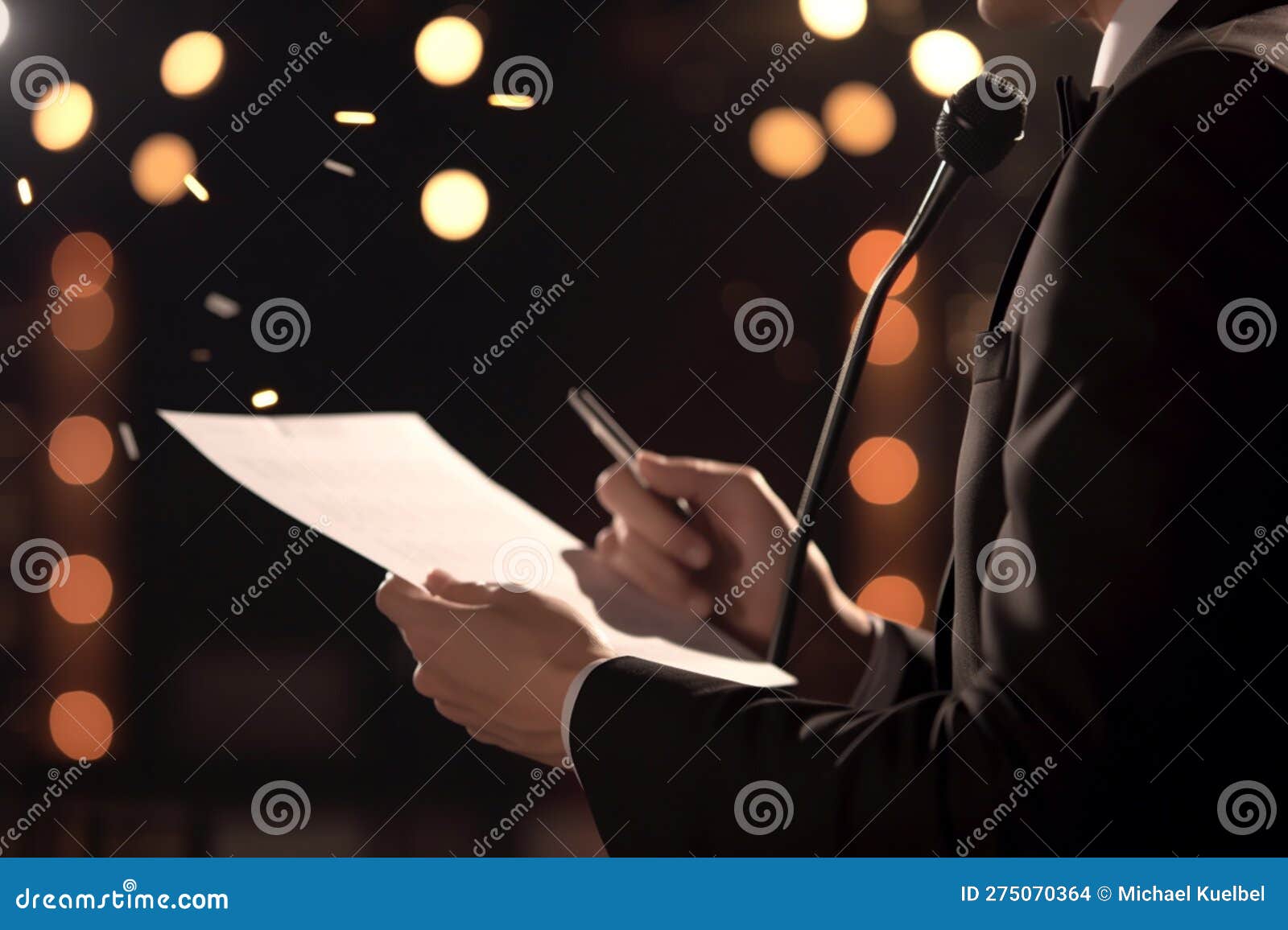 Keynote Speaker on Podium with Script and Microphone in Bright ...