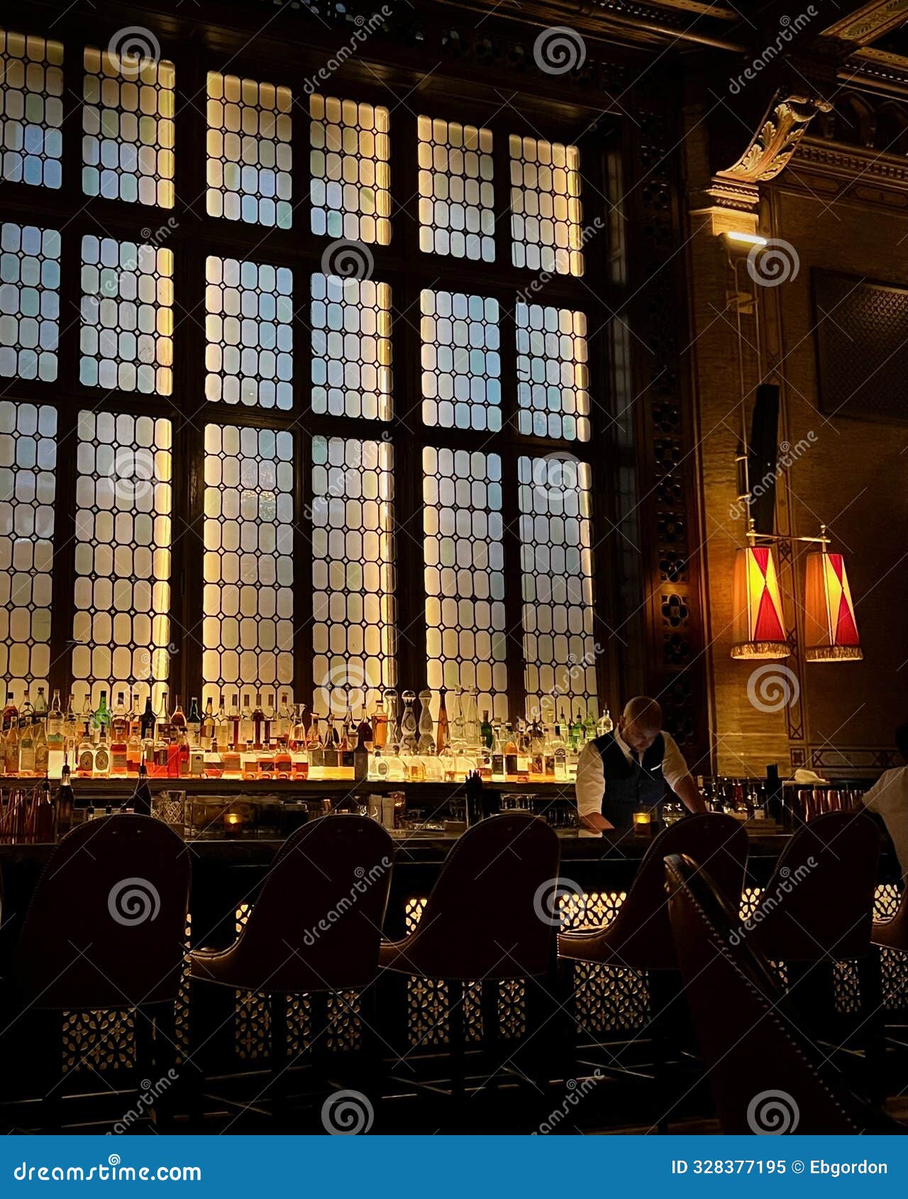 Golden Hour Elegance: a Quiet Moment at the Bar Editorial Image - Image ...