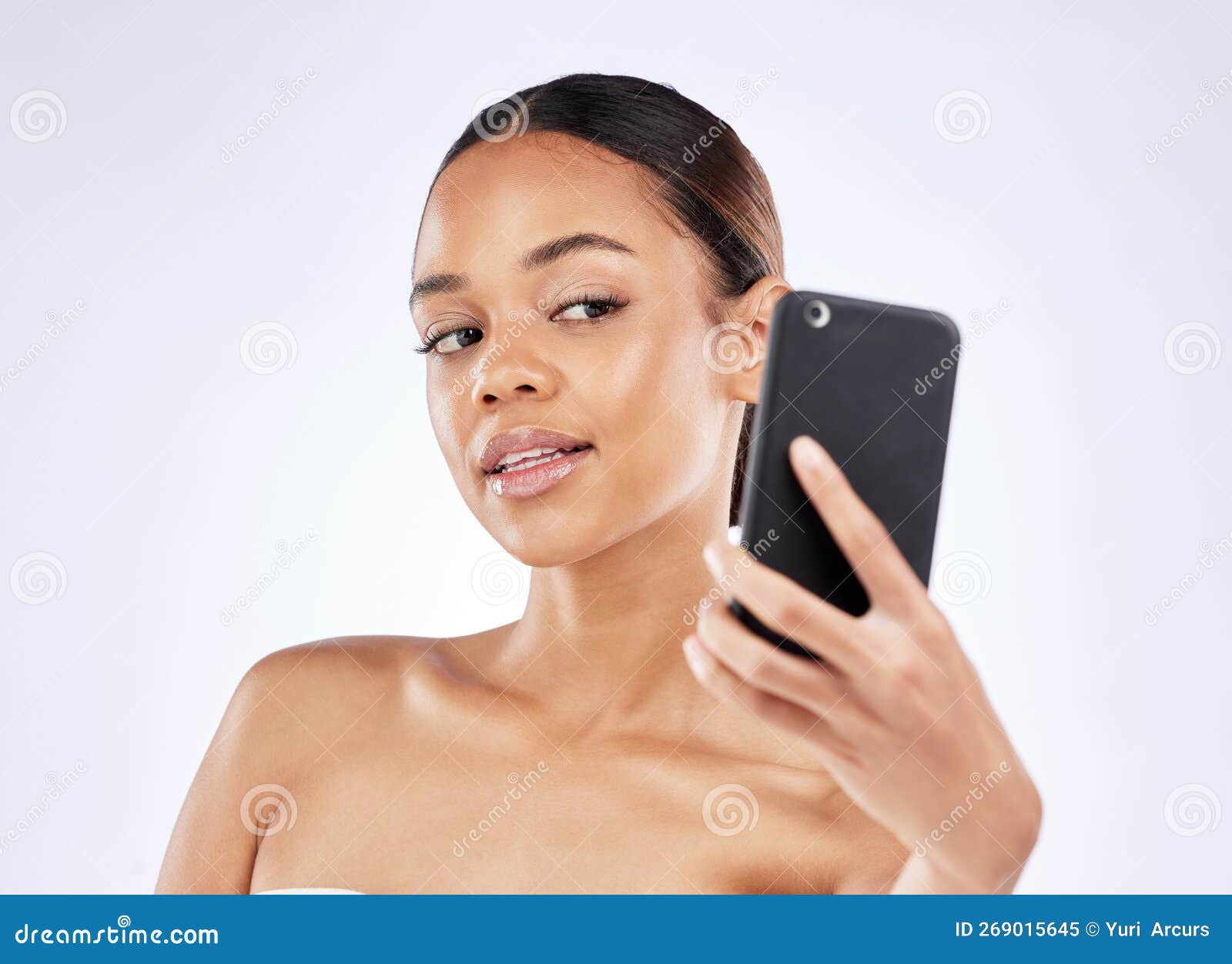 Capturing the Essence of Me. a Young Woman Talking Selfies Using a ...