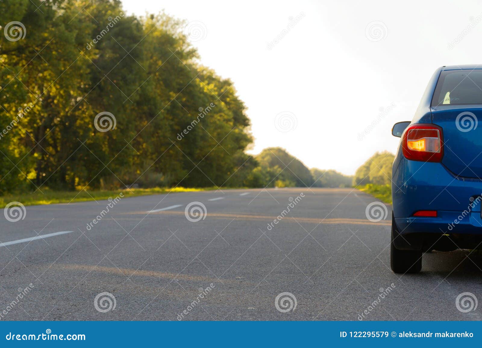 The Blue Car is on the Roadside Stock Image - Image of roadside, light ...