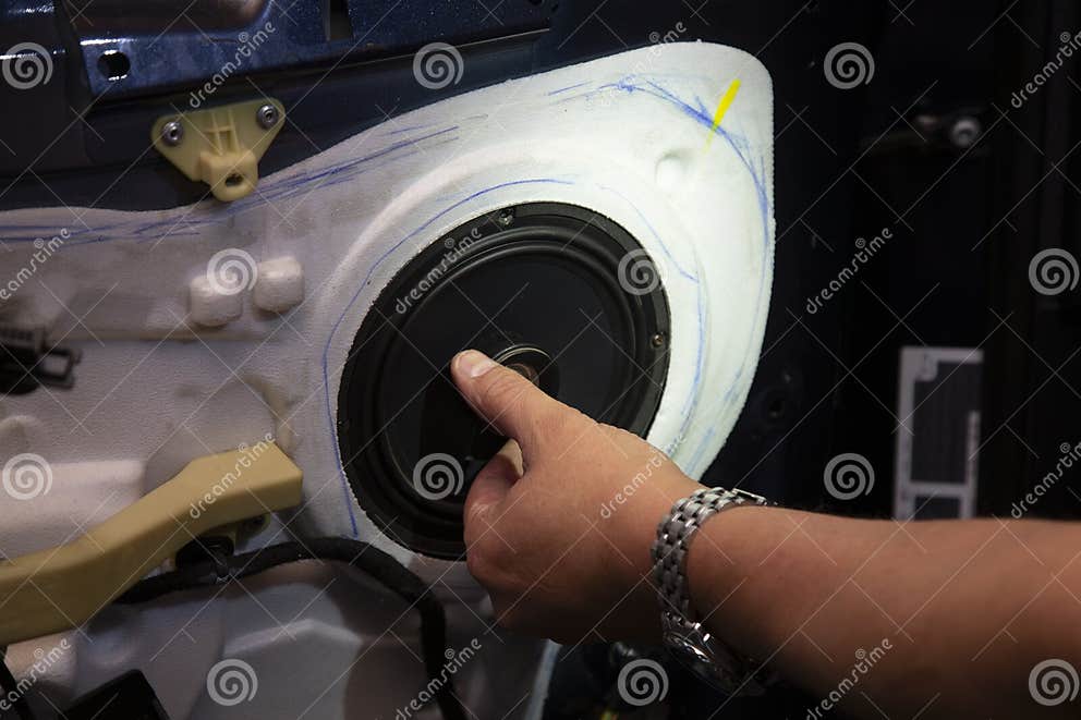 Car Audio System.Installation of Acoustics in the Front Doors of the ...