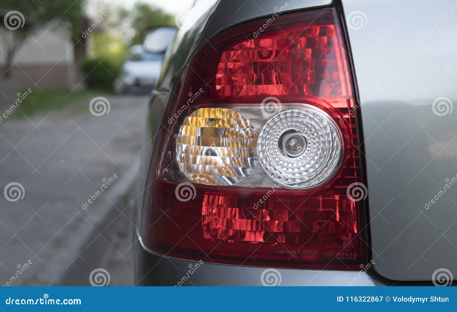 Car Back Side with a Back Light on the Stree with a Daylight. Backlight ...