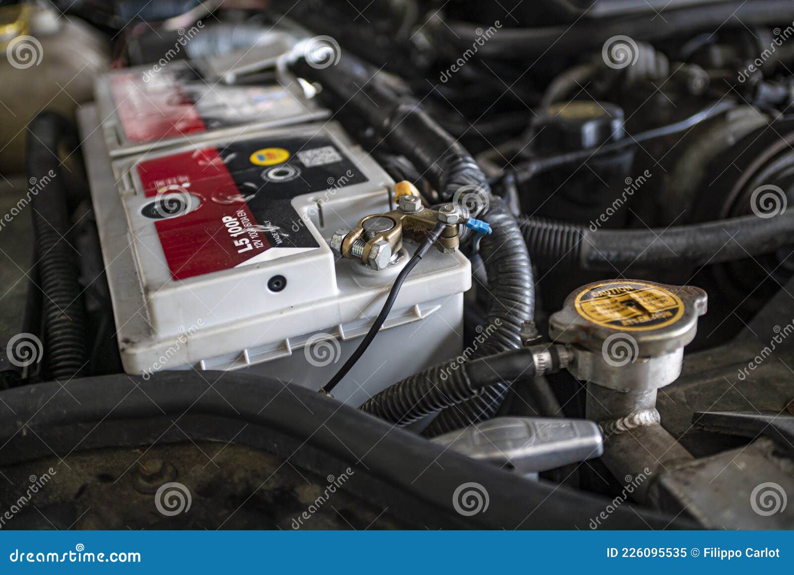Car battery in the engine editorial image. Image of interface - 226095535