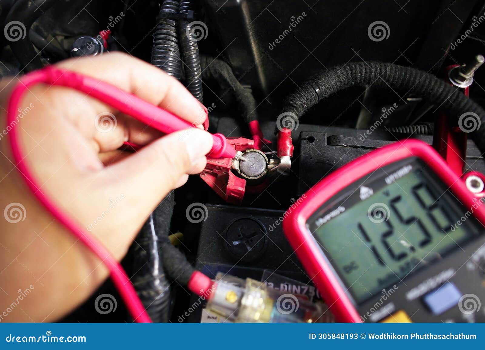 Car Battery Voltage Testing with a Digital Multimeter by Auto ...