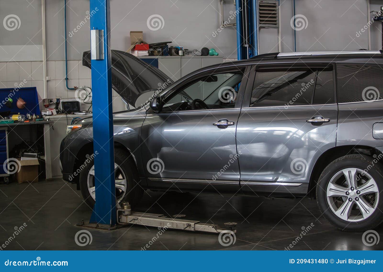Car Being Repaired in a Car Service Stock Photo - Image of diagnostics ...