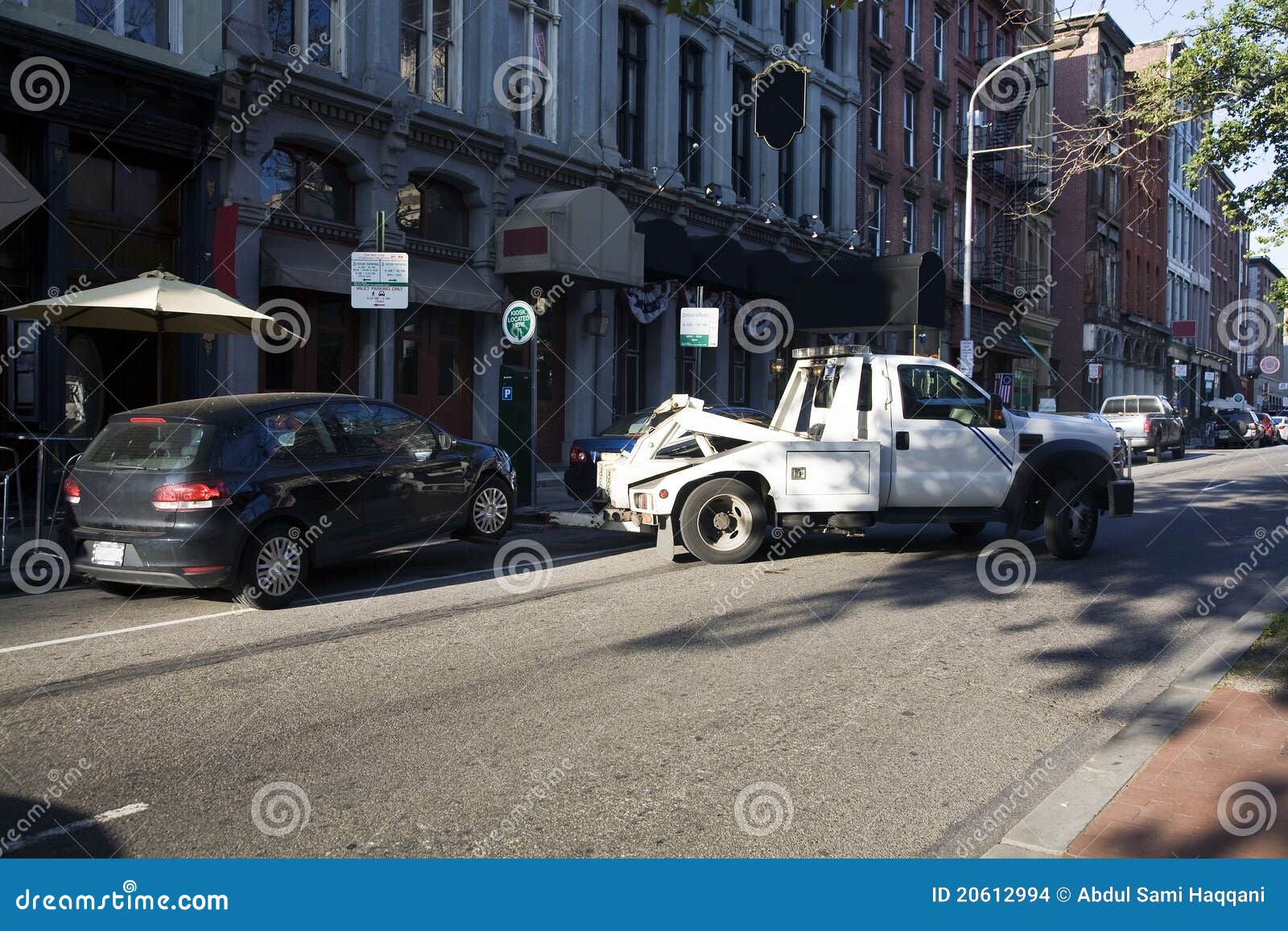 Car being towed stock photo. Image of truck, buildings - 20612994