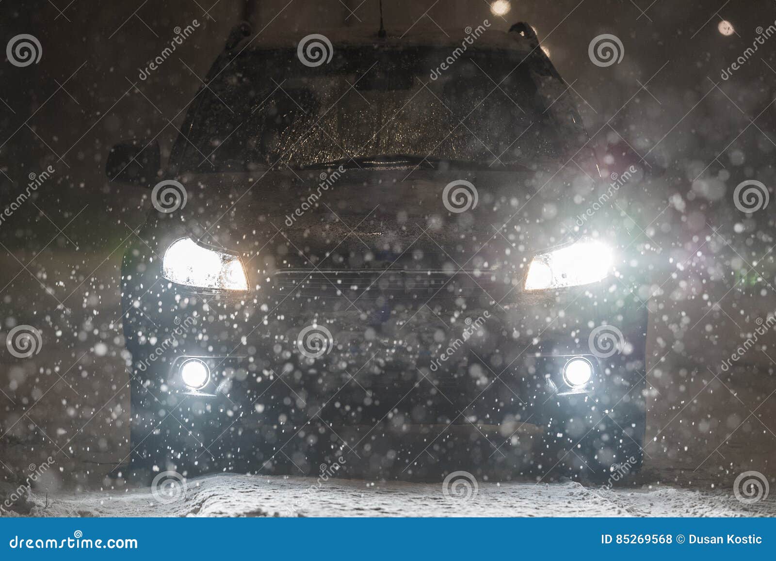 Car in blizzard stock photo. Image of light, fall, snowflake - 85269568