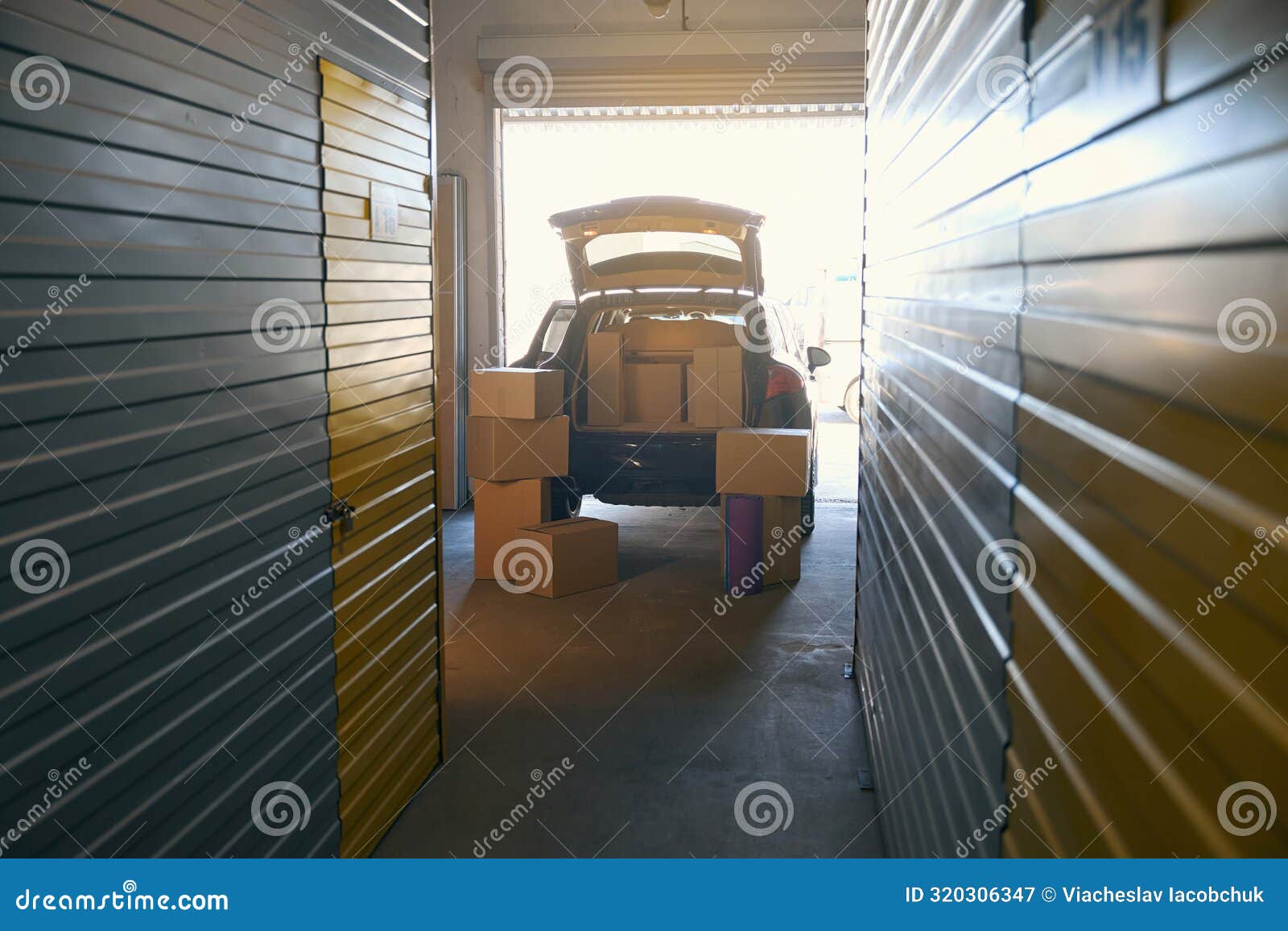 Car with Boxes in the Trunk is in the Storage Service Stock Image ...