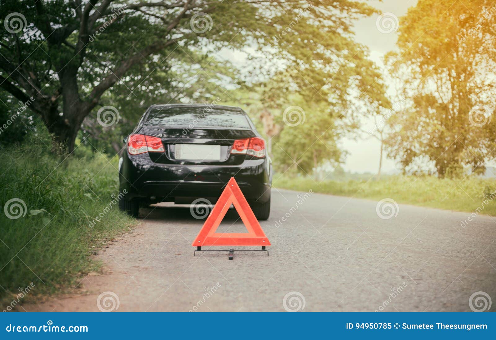 A Car Breakdown with Red Triangle of a Car on the Road Stock Image ...