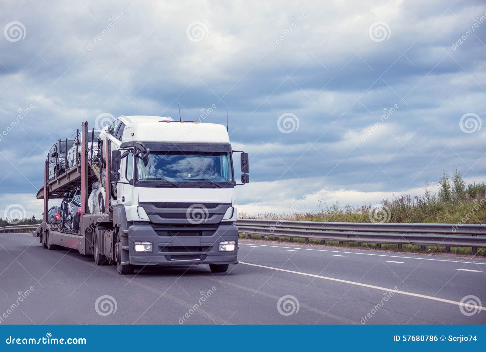 Car carrier on the highway stock photo. Image of auto - 57680786