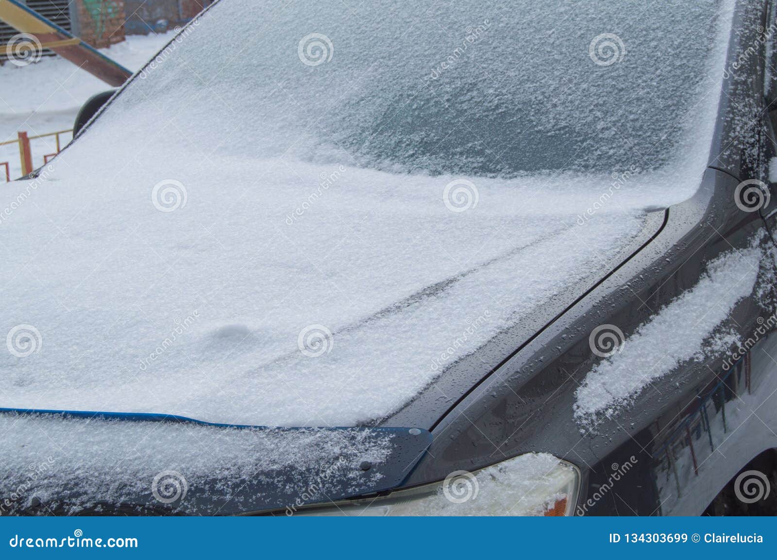 The Car is Covered with Snow on a Winter Day, Front Window Windshield ...