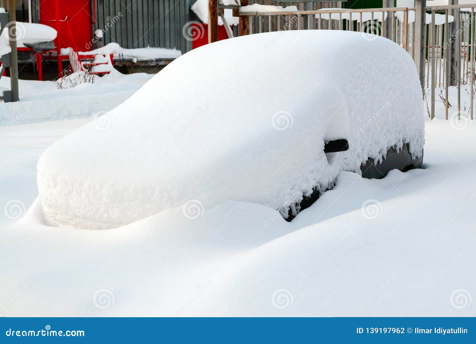 Consequences of Heavy Snowfall. the Car is Covered with a Thick Layer ...