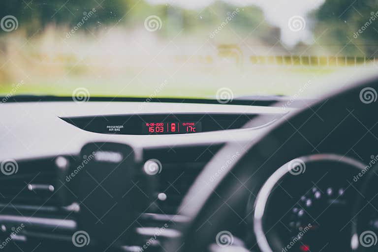 Car Dashboard Showing Outside Temperature and Time Stock Image - Image ...