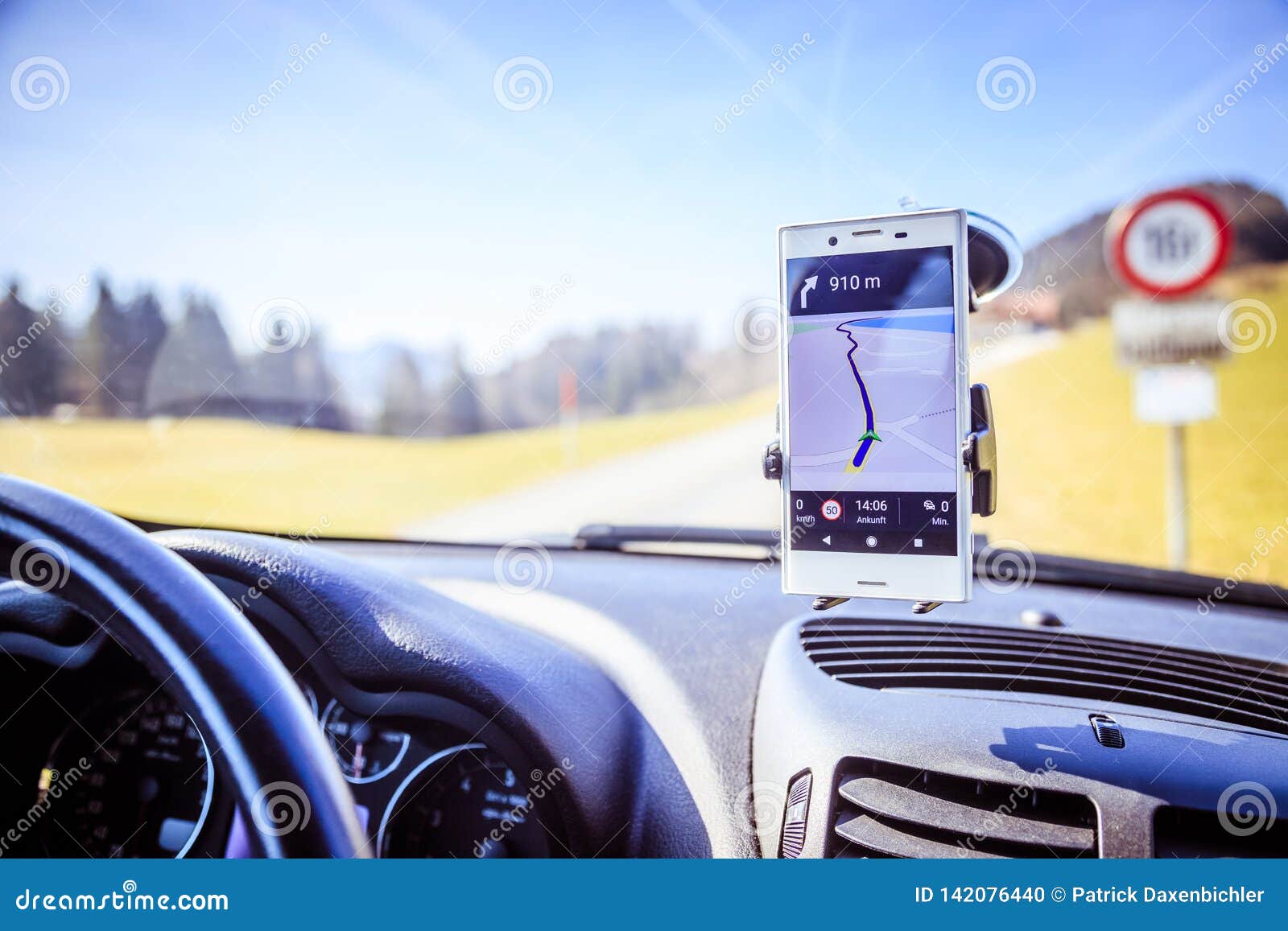 Car Dashboard with Smartphone Used As Navigation Device, Bright and ...
