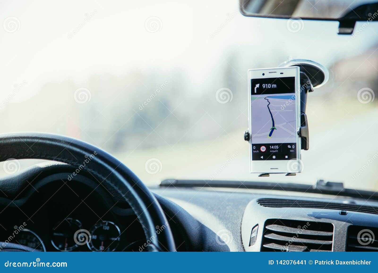 Car Dashboard with Smartphone Used As Navigation Device, Bright and ...