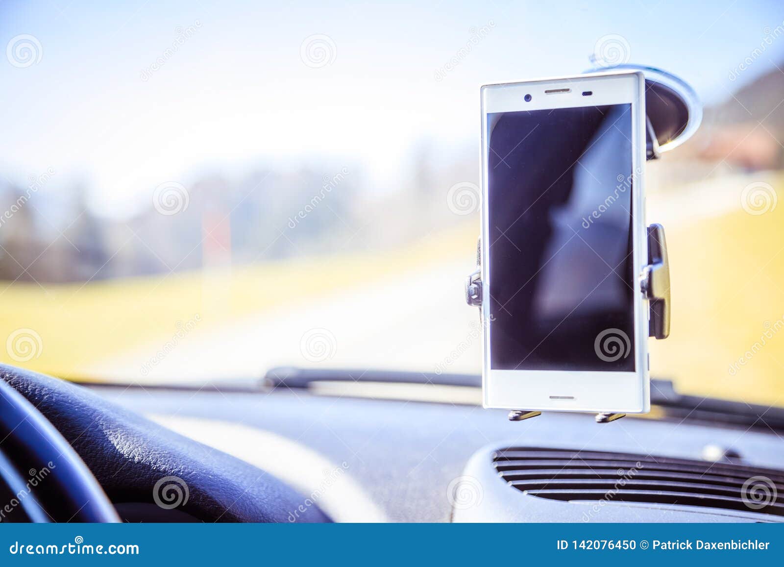 Car Dashboard with Smartphone Used As Navigation Device, Bright and ...