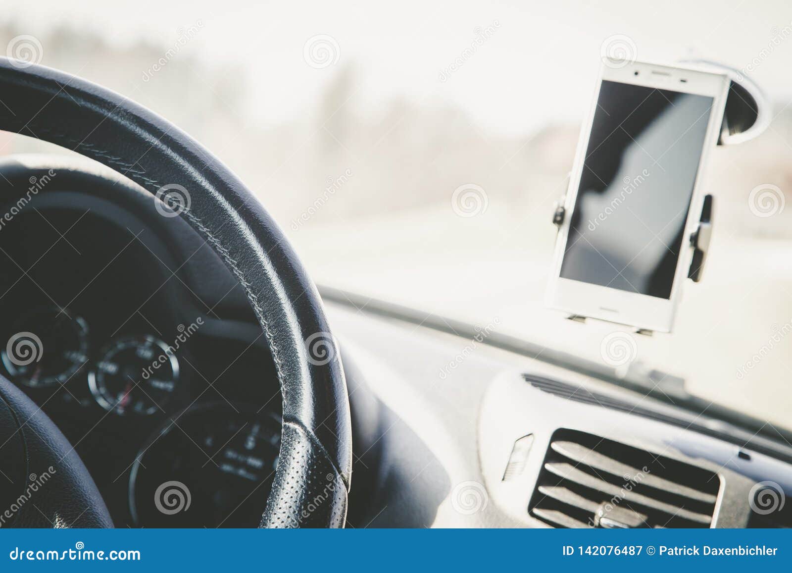 Car Dashboard with Smartphone Used As Navigation Device, Bright and ...