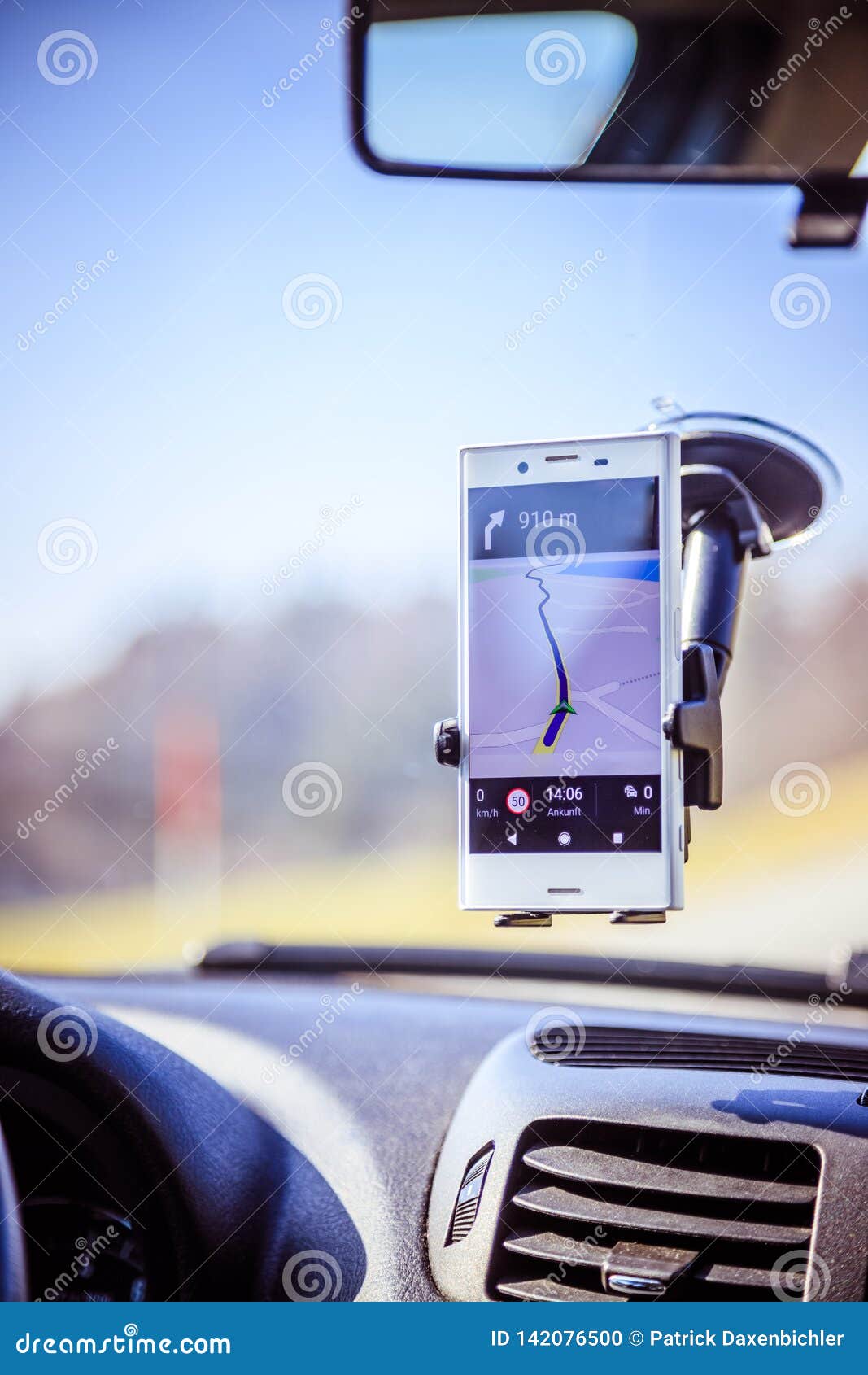 Car Dashboard with Smartphone Used As Navigation Device, Bright and ...