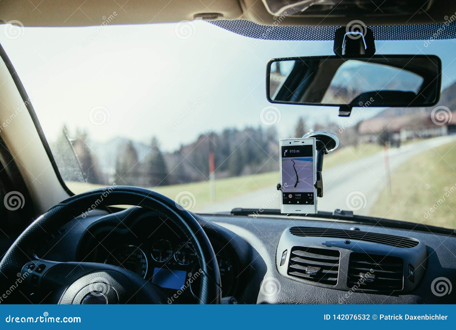 Car Dashboard with Smartphone Used As Navigation Device, Bright and ...