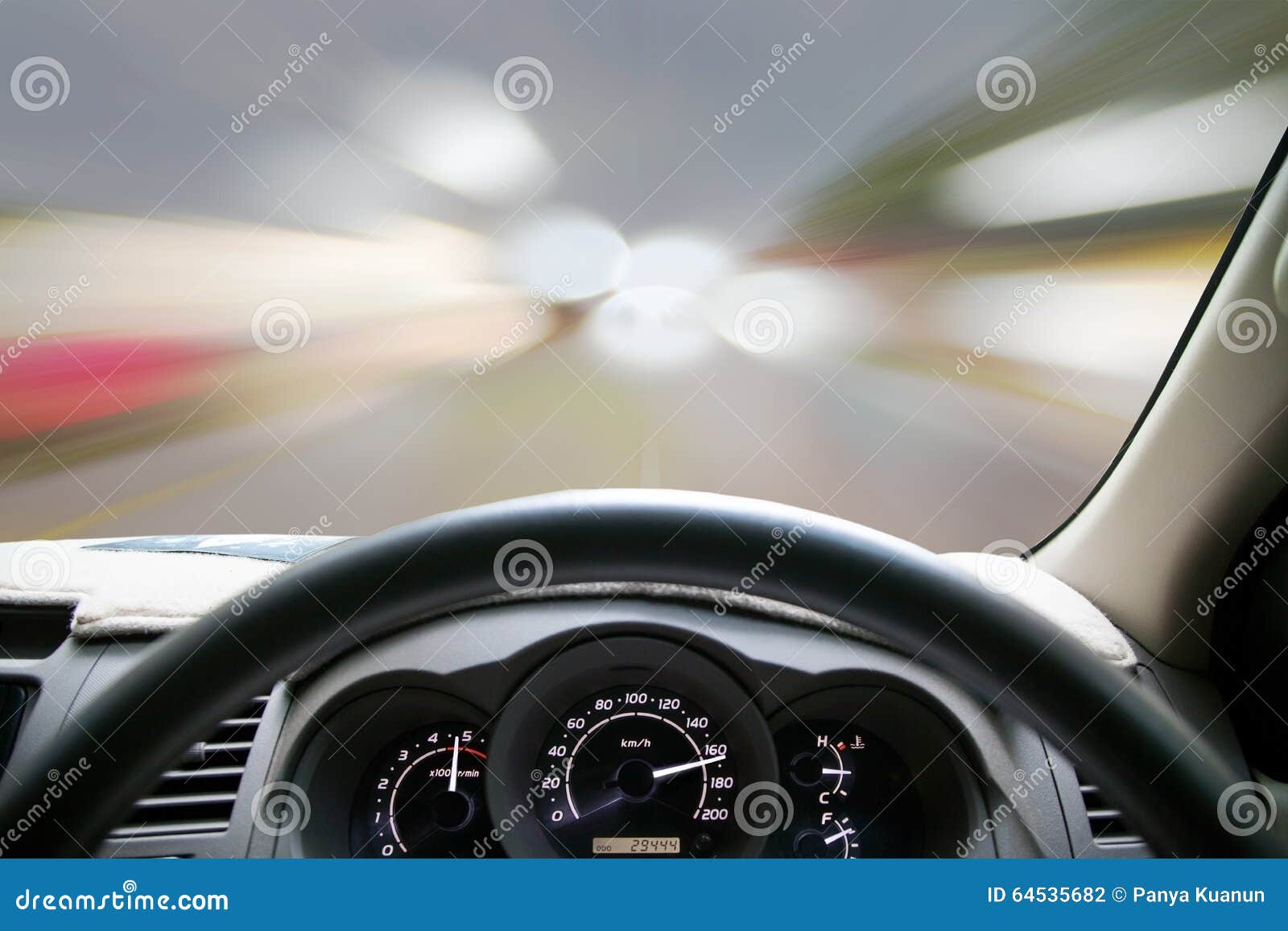 Car Dashboard Speeds while on the Road. Car Driving Fast. Stock Photo ...