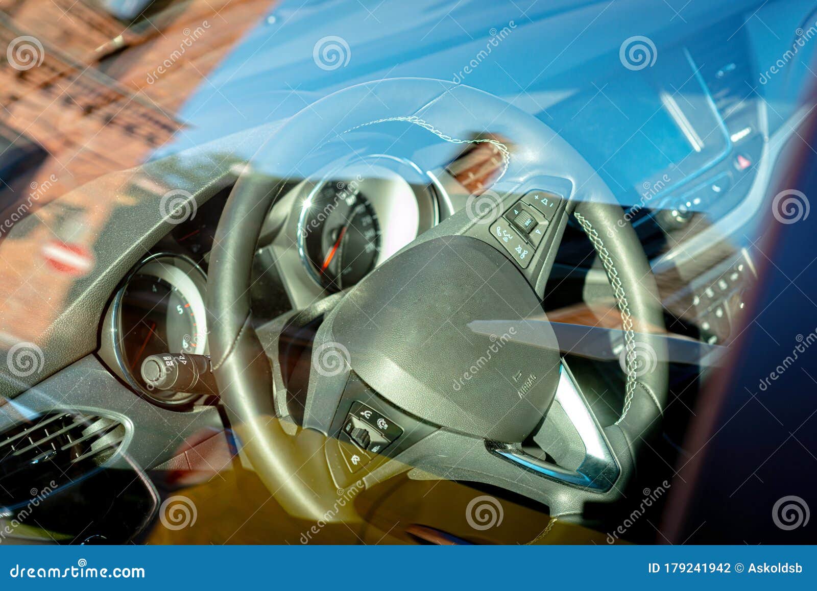 Car Dashboard and Steering Wheel through the Window on a Sunny Day ...