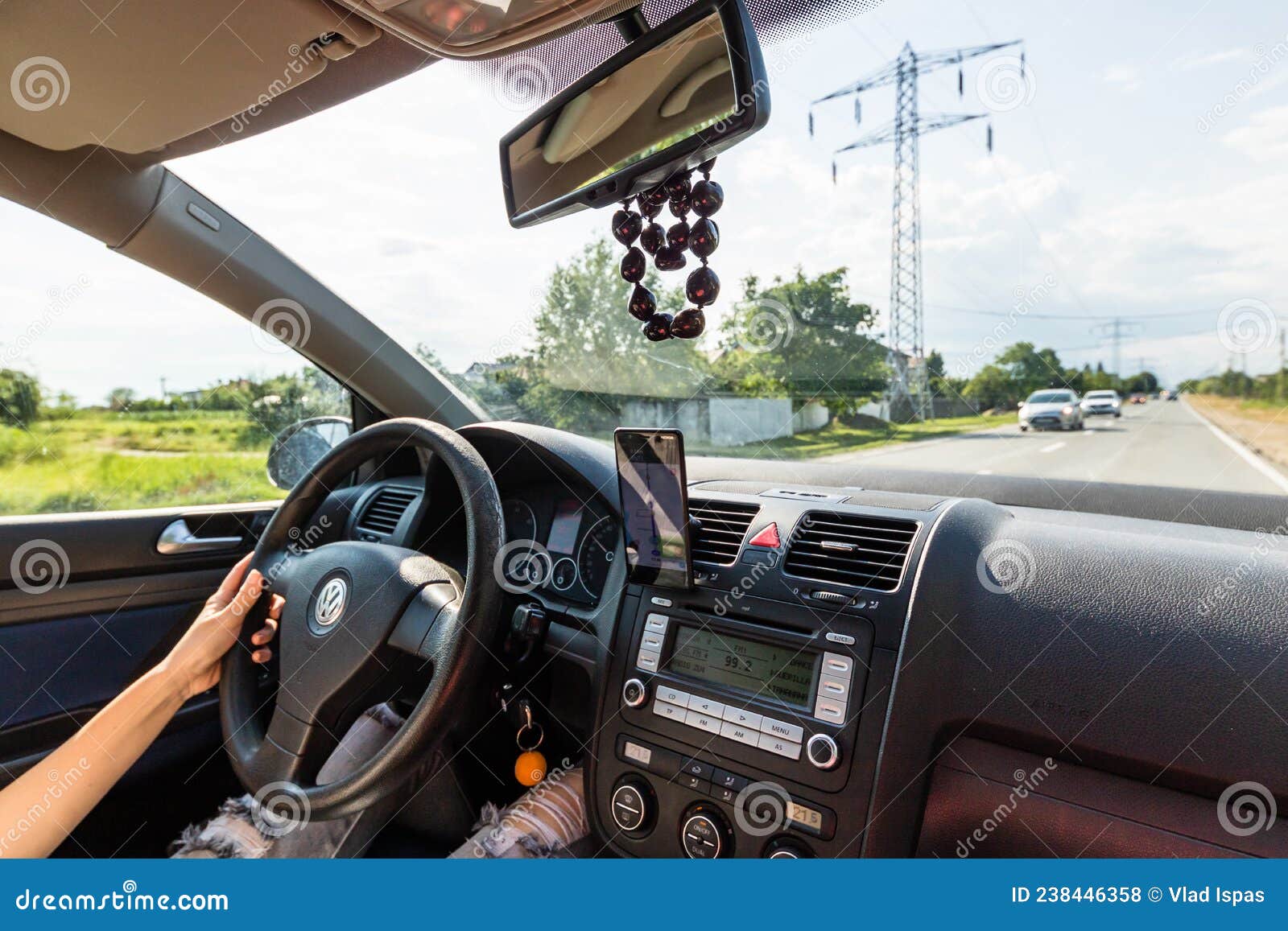 In Car Dashboard View with Smartphone on Waze Maps. Driver Using Waze ...