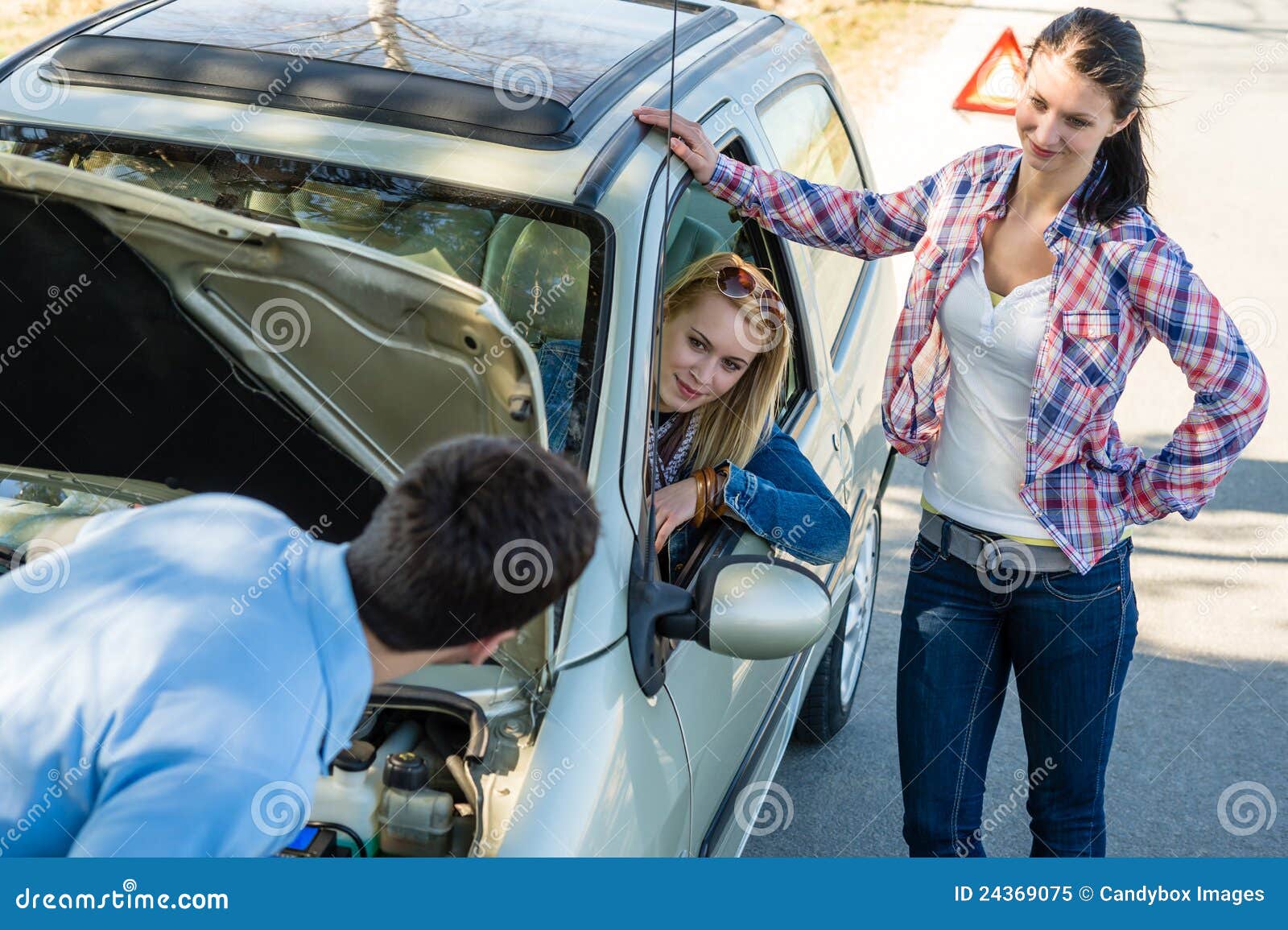 Car Defect Man Helping Two Female Friends Stock Image - Image of ...