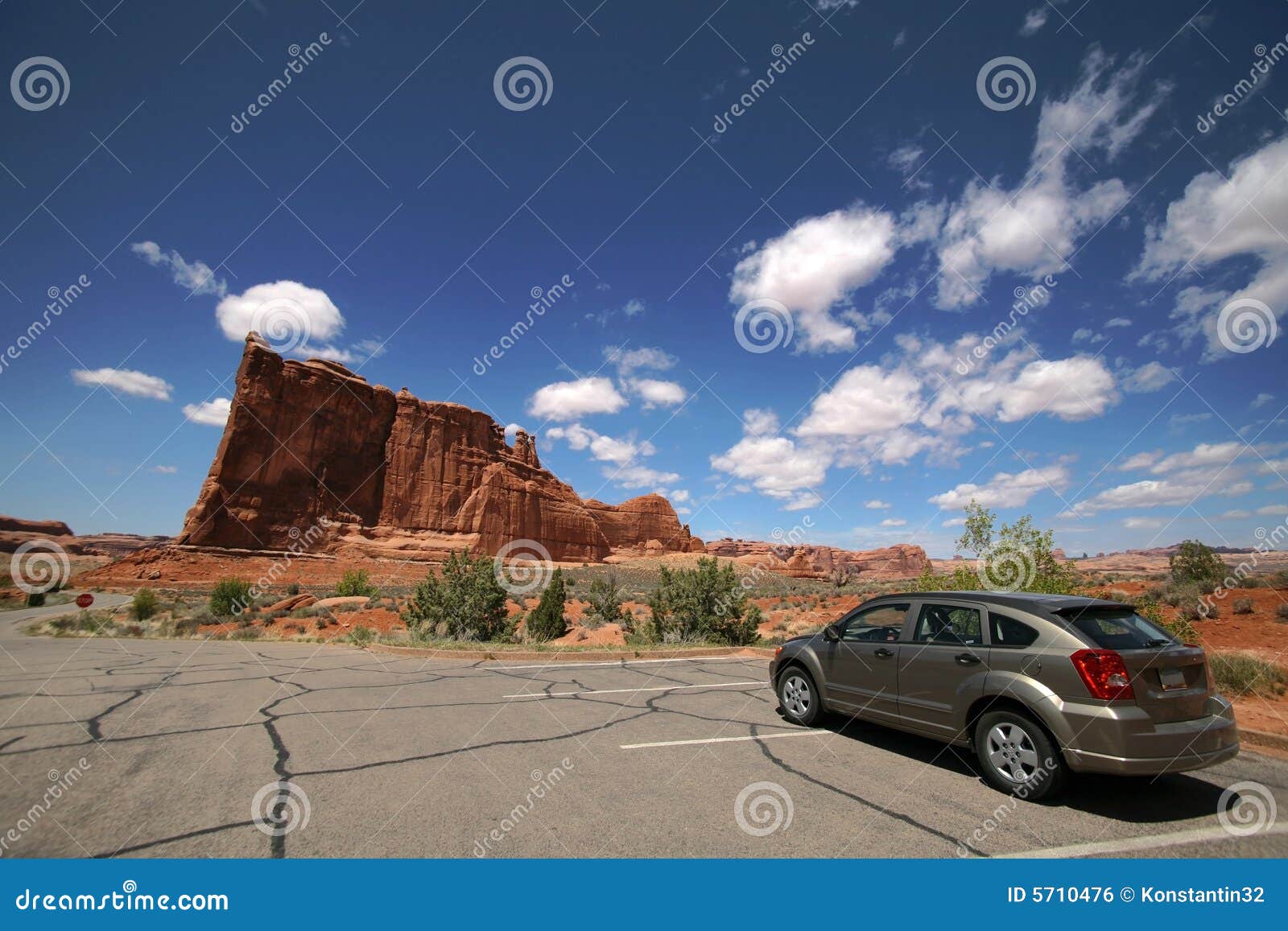 Car in the Desert, Arches National Park,Utah Stock Photo - Image of ...