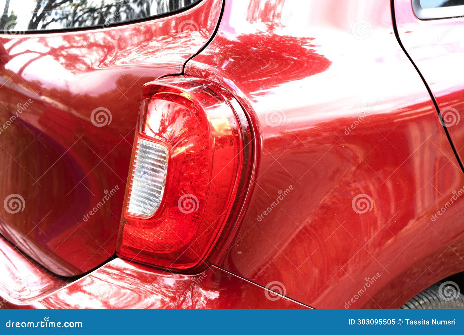 Car Detail Series: Close-up of the Red Tail Light, Parked Under the ...