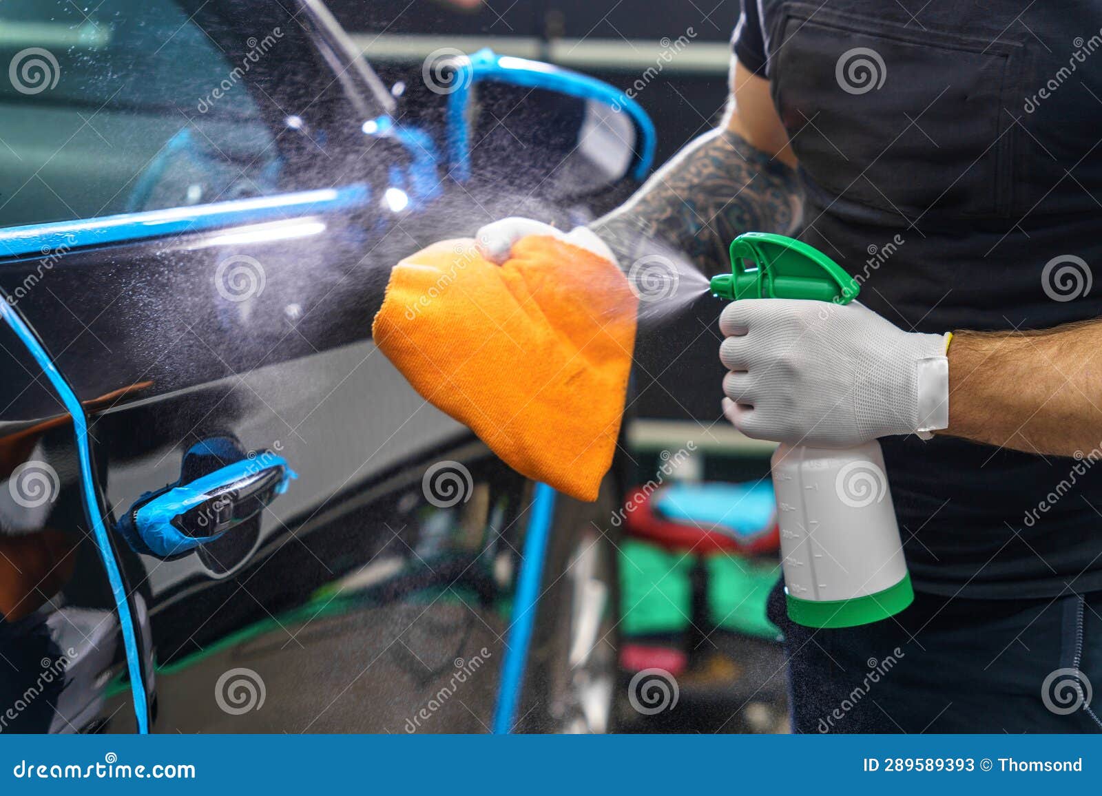 Car Detailing Studio. Man Sawing Cleaner on a Rag Stock Image - Image ...