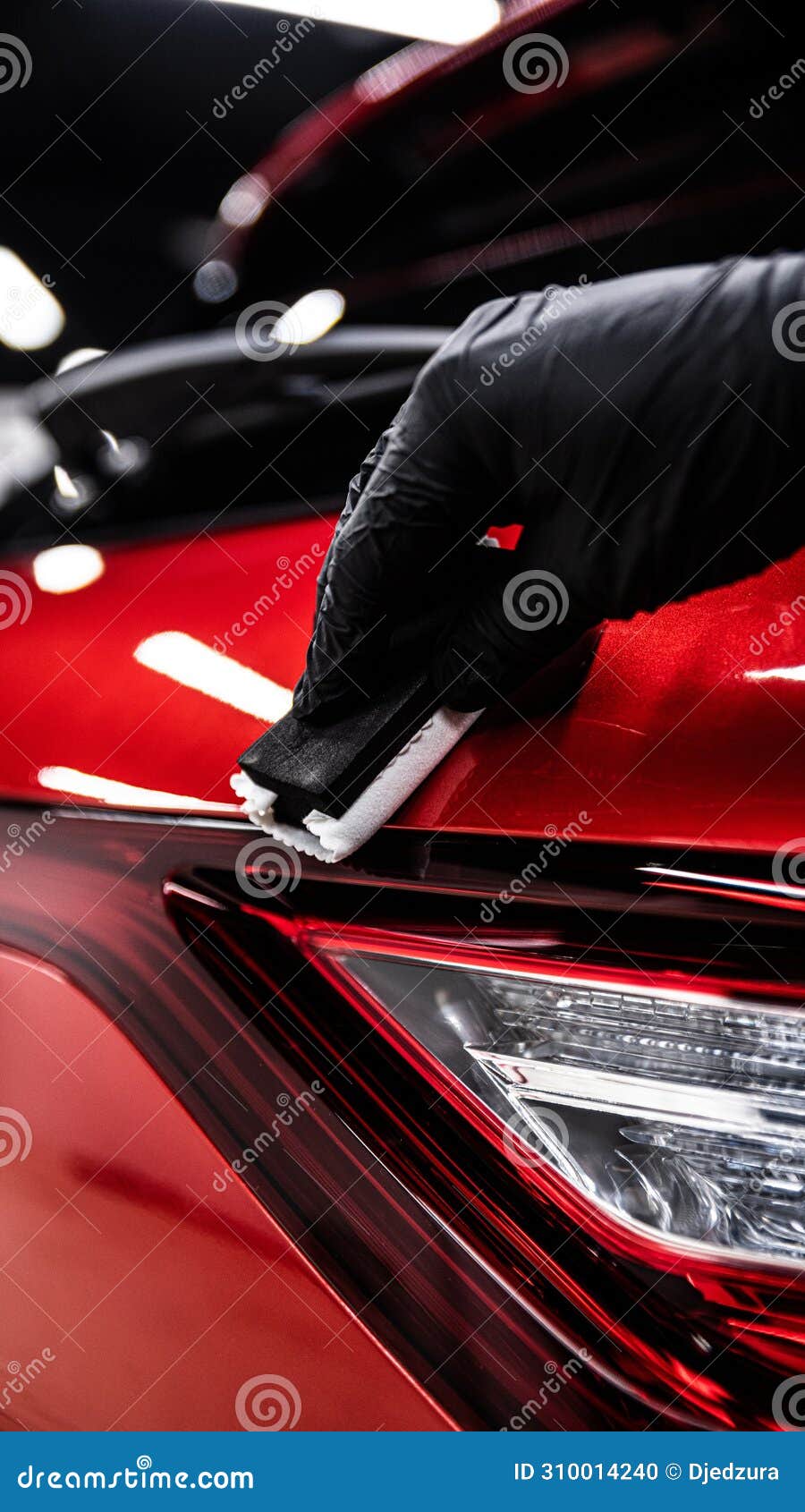 Car Detailing or Car Wash Worked Applying Ceramic Coating on Red Car ...