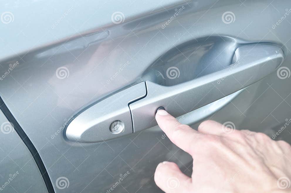 Car Door Opened by Finger Pushing Button and Pulling Stock Photo ...