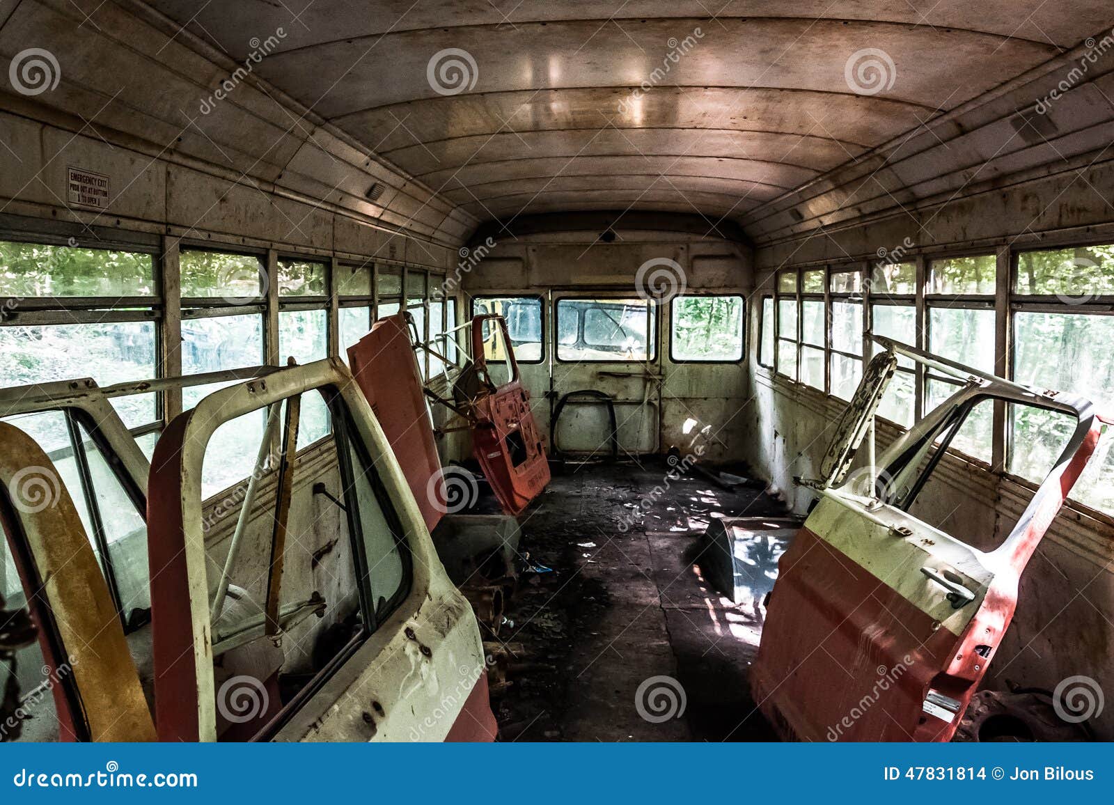 Car Doors Inside of a Old School Bus in a Junkyard Stock Photo - Image ...