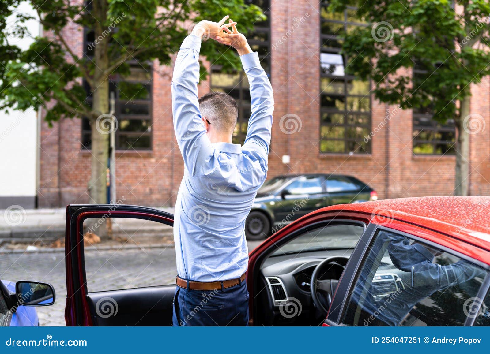 Car Driver Doing Stretch Exercise during Break Stock Image - Image of ...