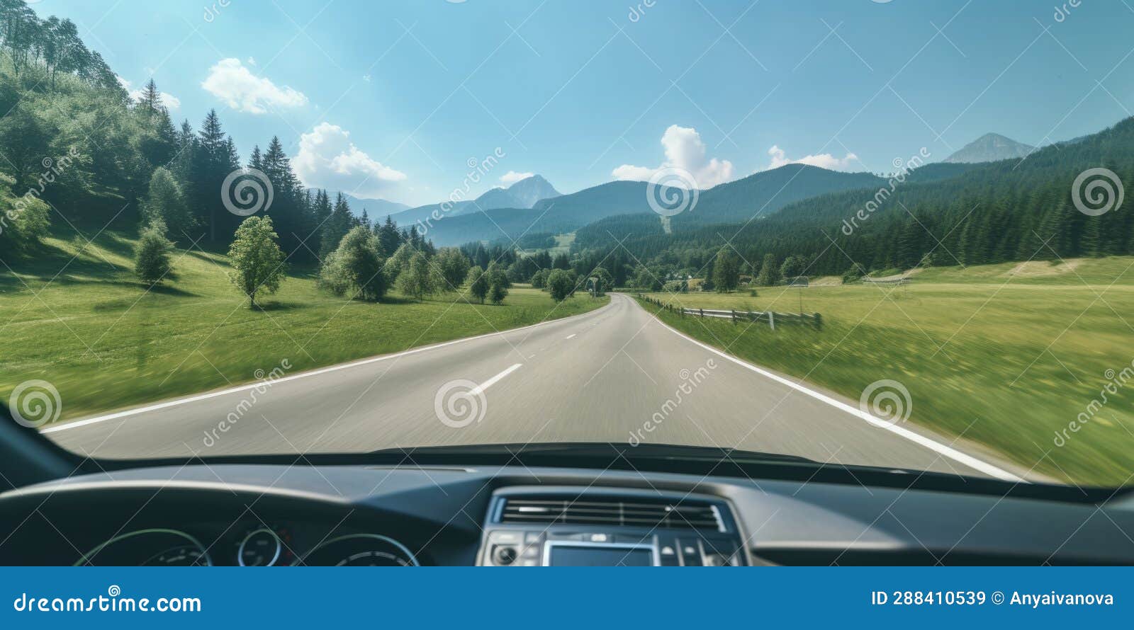 A Car Driving Down a Country Road with Mountains in the Background ...