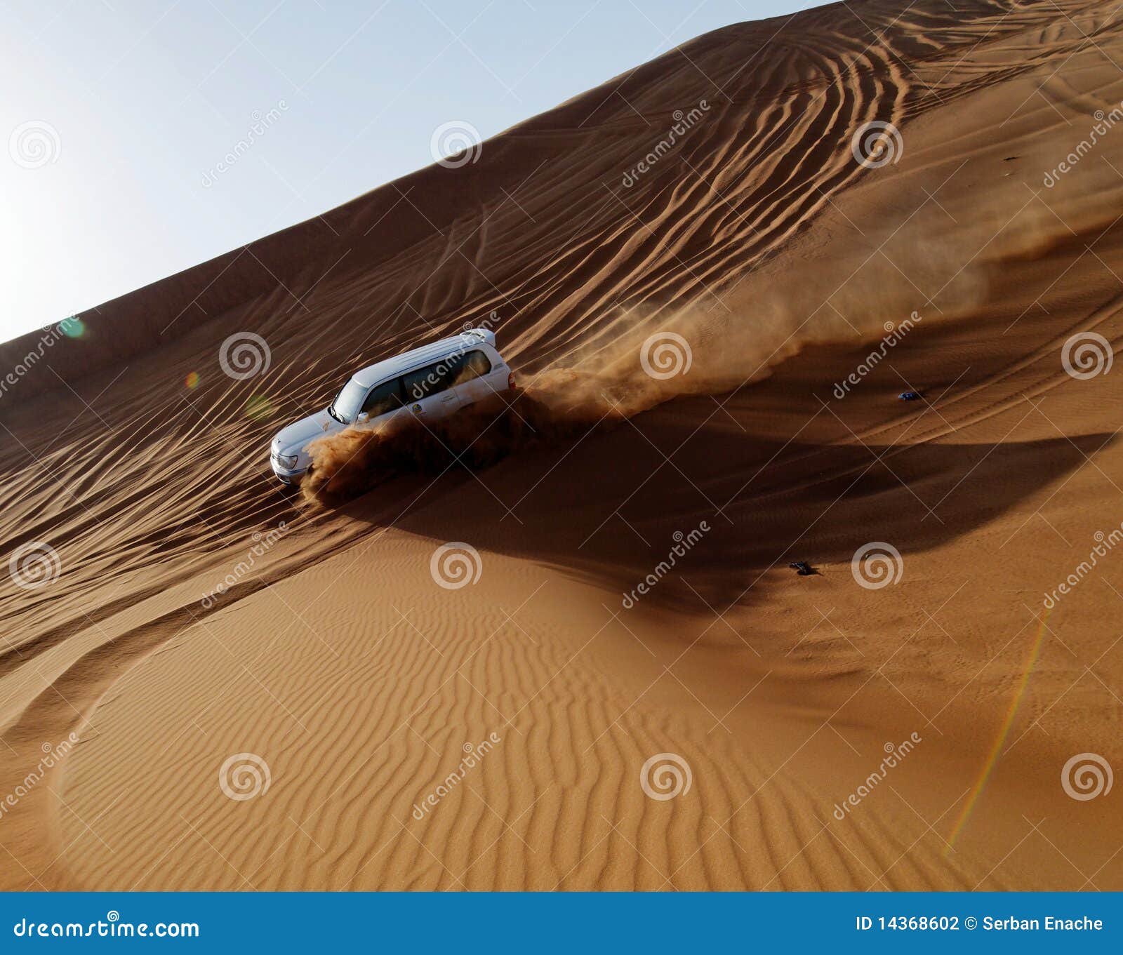 Car driving down sand dune stock photo. Image of motor - 14368602