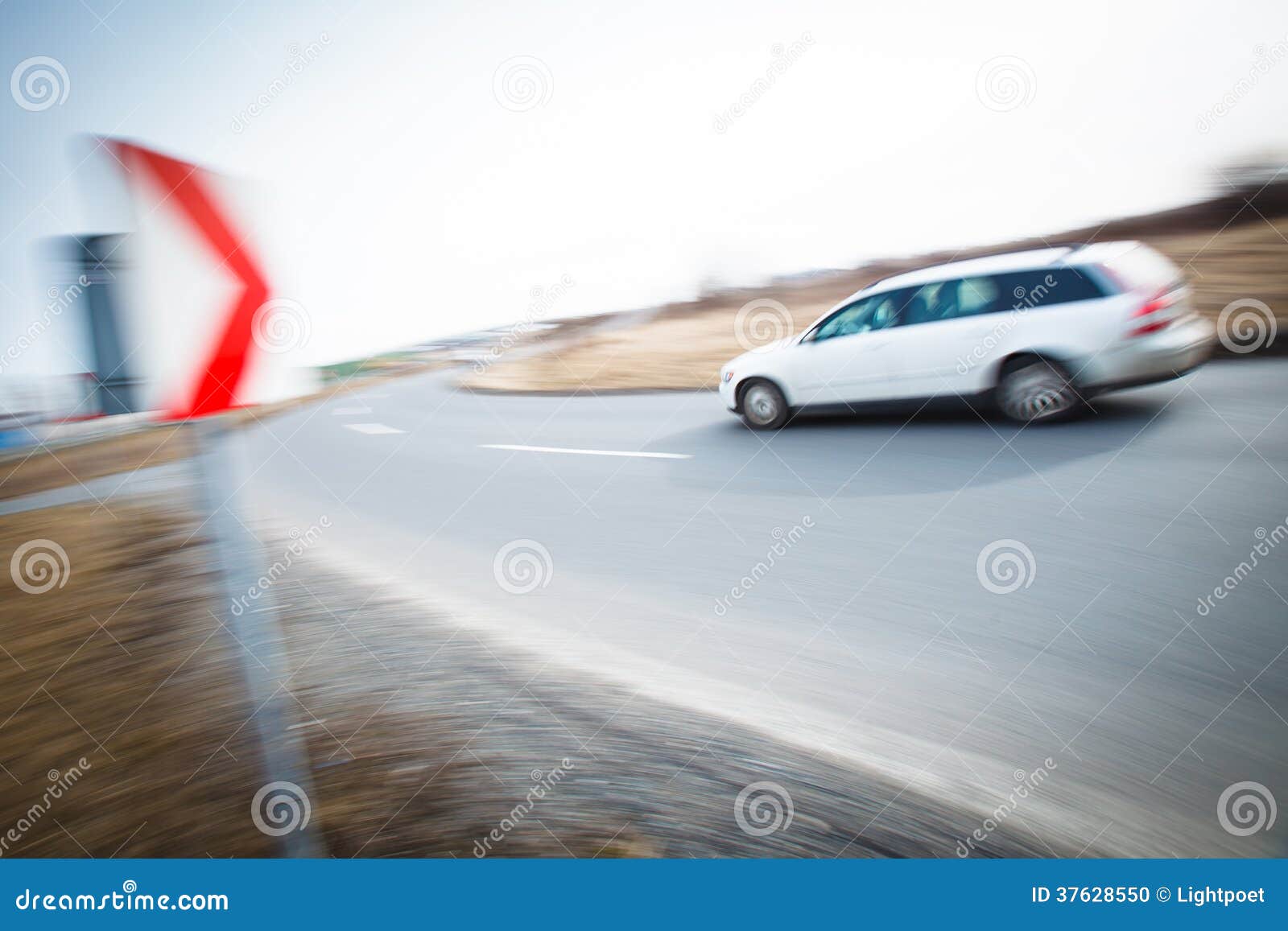 Car Driving Fast through a Sharp Turn Stock Photo - Image of driving ...
