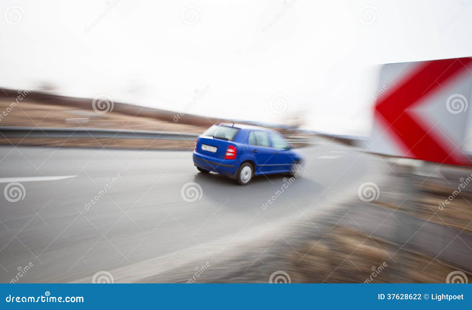 Car Driving Fast through a Sharp Turn Stock Photo - Image of movement ...